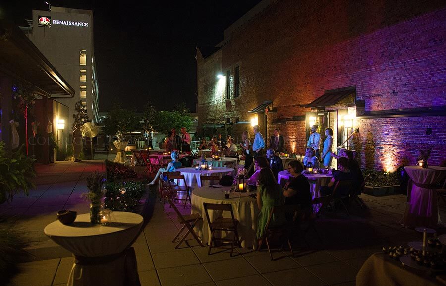 A rooftop wedding ceremony & ballroom reception at Alley Station